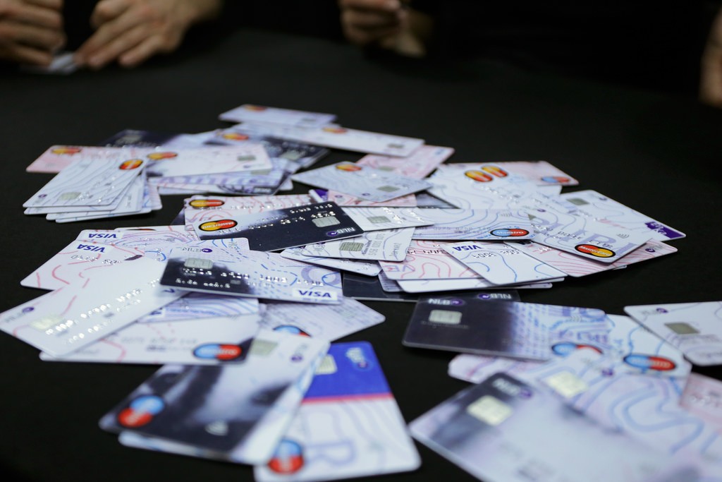 Self portraits for bank cards investigate money circulation, art ...